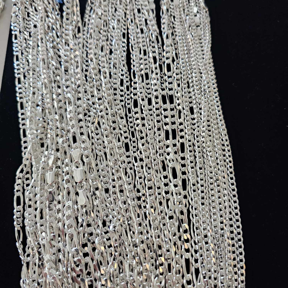 Unlocking Elegance: Stacking Silver Chains & Crosses with Idaho Pawn ...